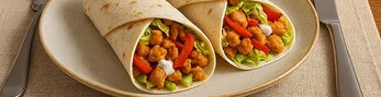 Recept: Pittige kipwraps met ijsbergsla en paprika