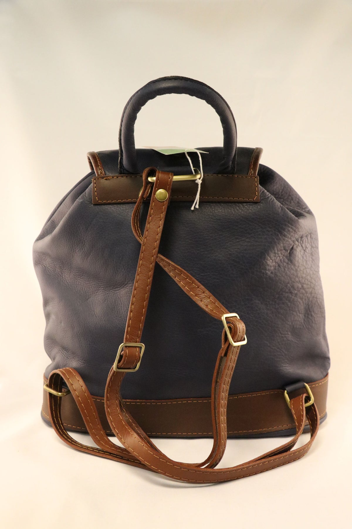 dames rugtas, donker blauw- bruin kleur | Kledingreparatie DenBosch Fashion